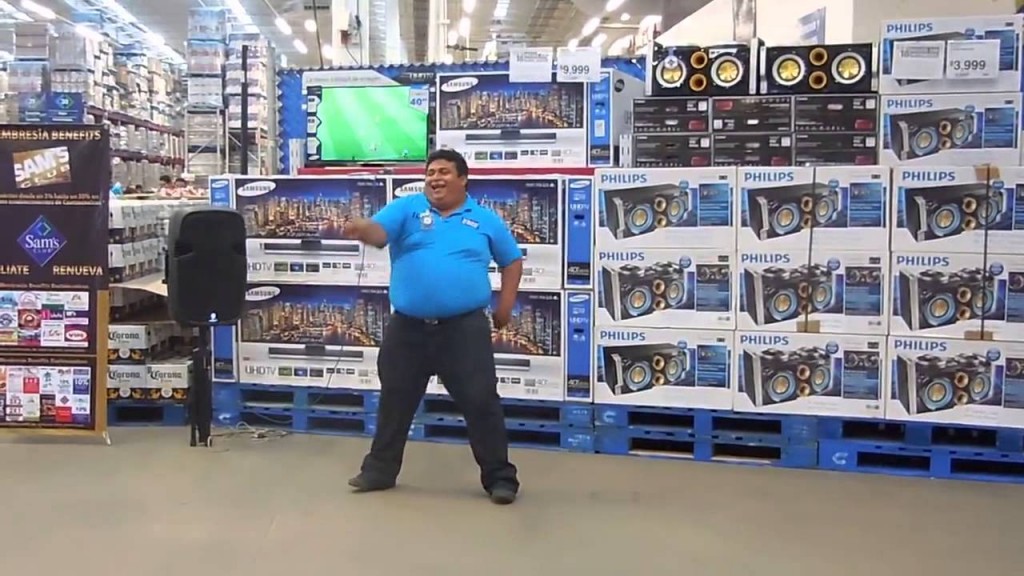 This Salesman Breaking Into a Dance Off With The Customers Is Glorious