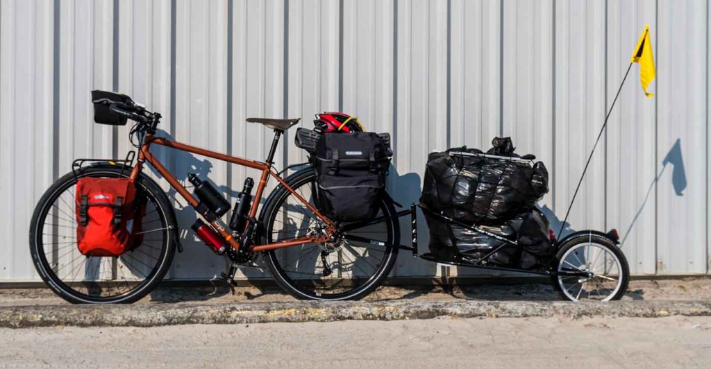 Couple Biking Across USA Collecting Trash Along Their Way