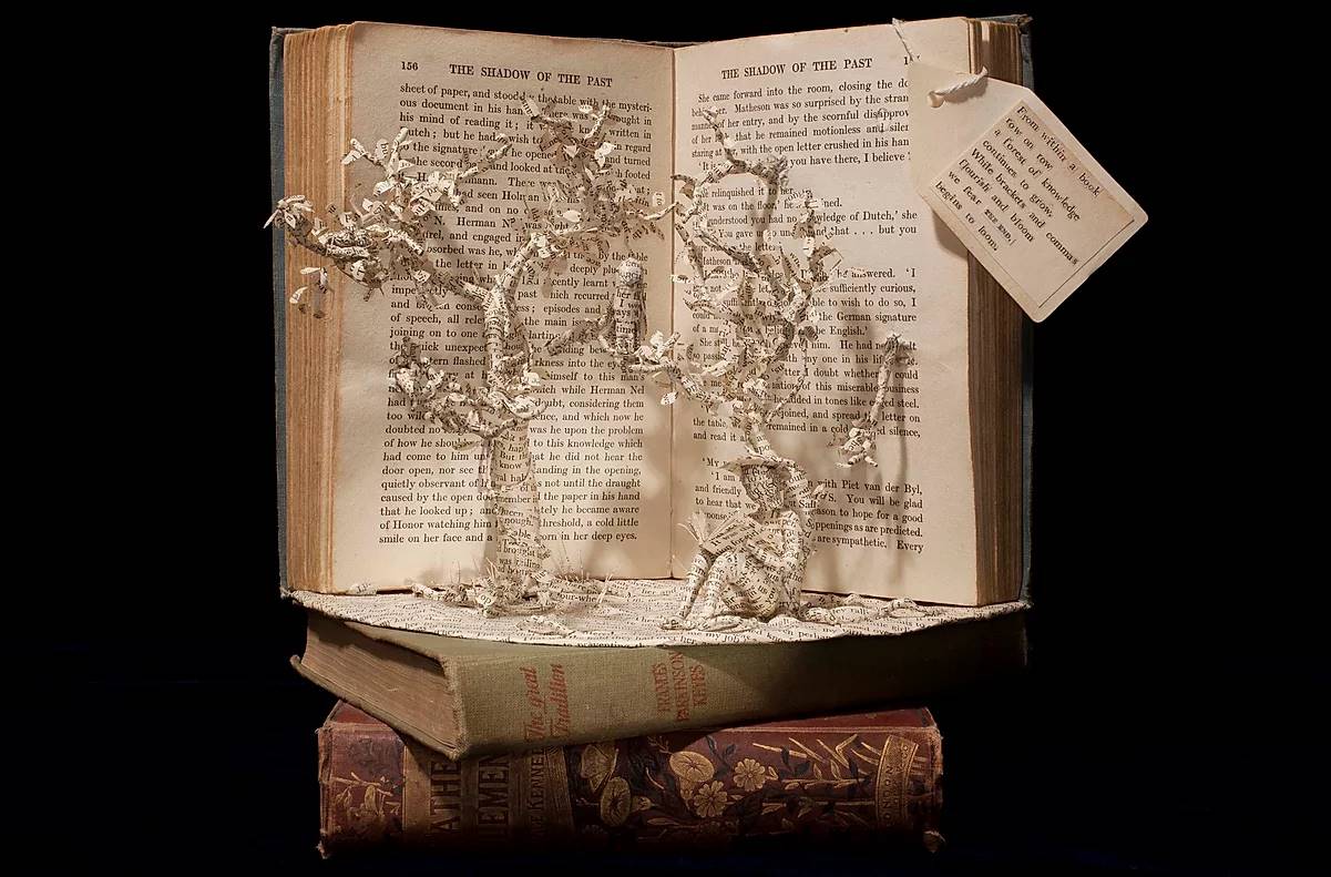 Artist creates incredible book sculptures from antique books paper